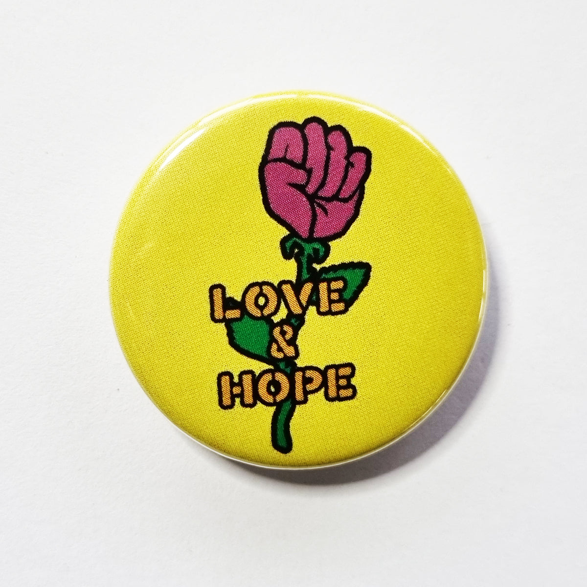 Love & Hope Badge – Heavy Manners Artivism